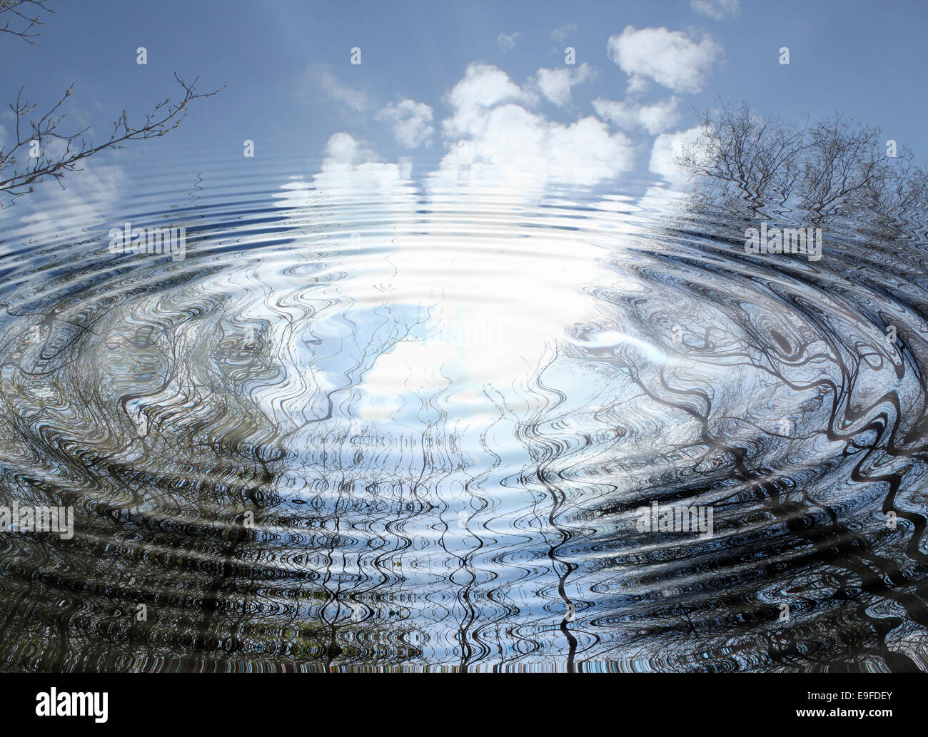 Reflections with ripples in water Stock Photo - Alamy