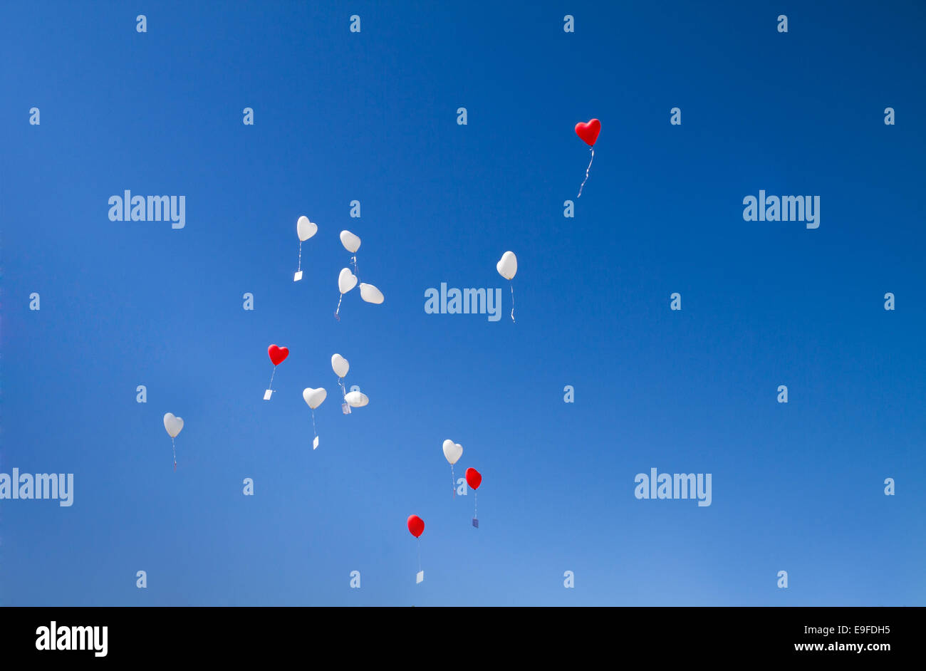 Rising heart balloons hi-res stock photography and images - Alamy