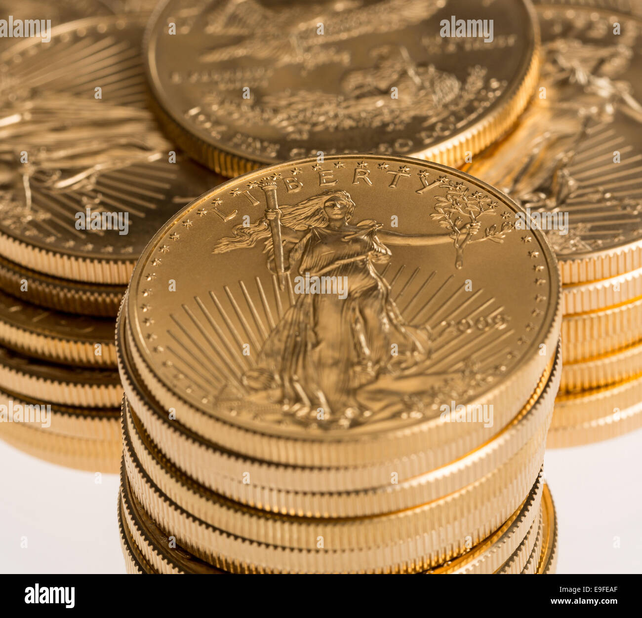Collection of one ounce gold coins Stock Photo - Alamy