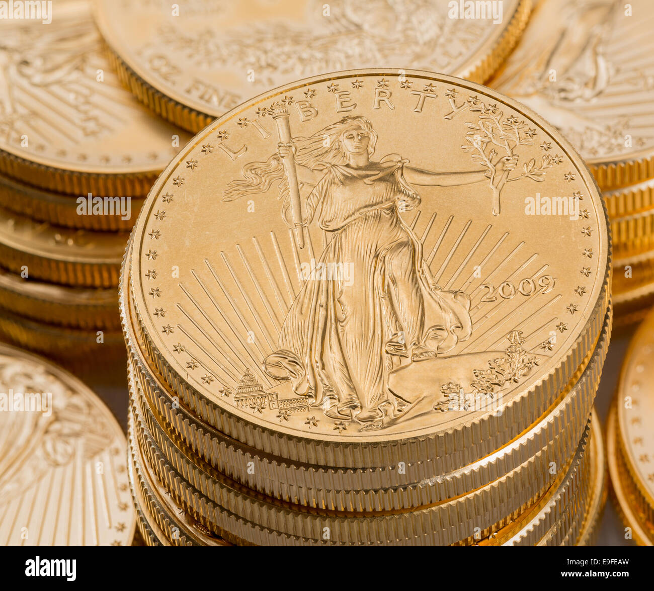 Collection of one ounce gold coins Stock Photo - Alamy