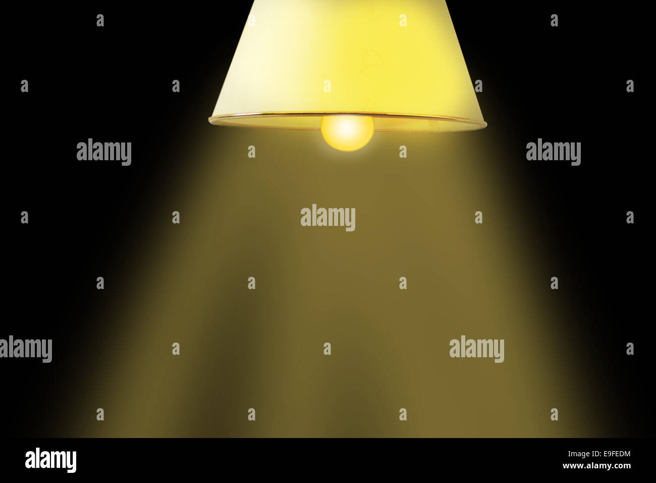 Electric lamp against a black wall Stock Photo - Alamy