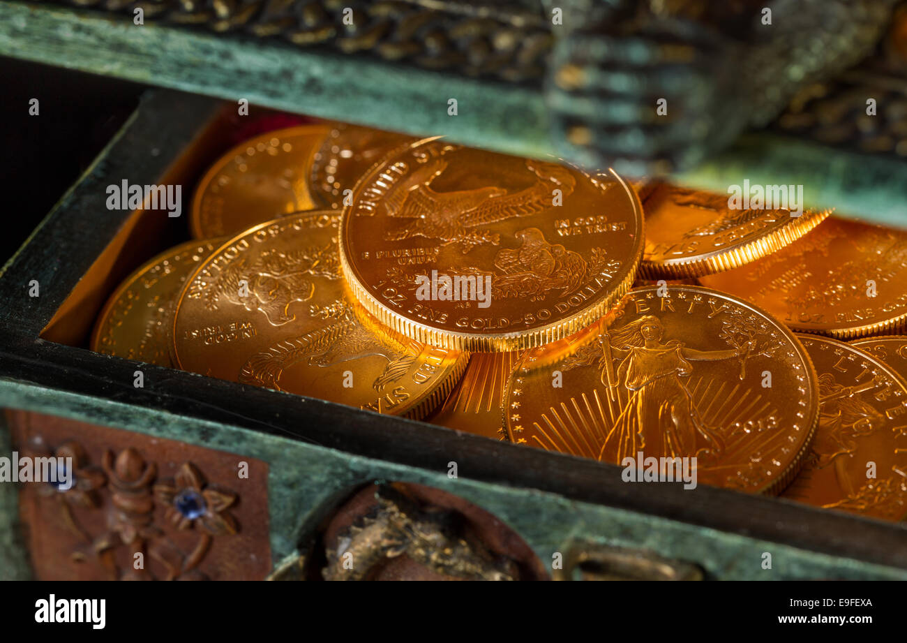 Collection of one ounce gold coins Stock Photo - Alamy