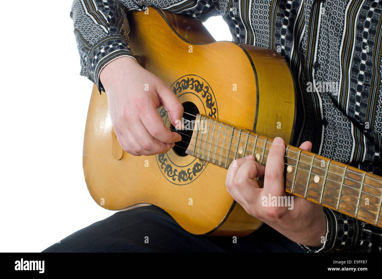The man plays an acoustic guitar Stock Photo - Alamy