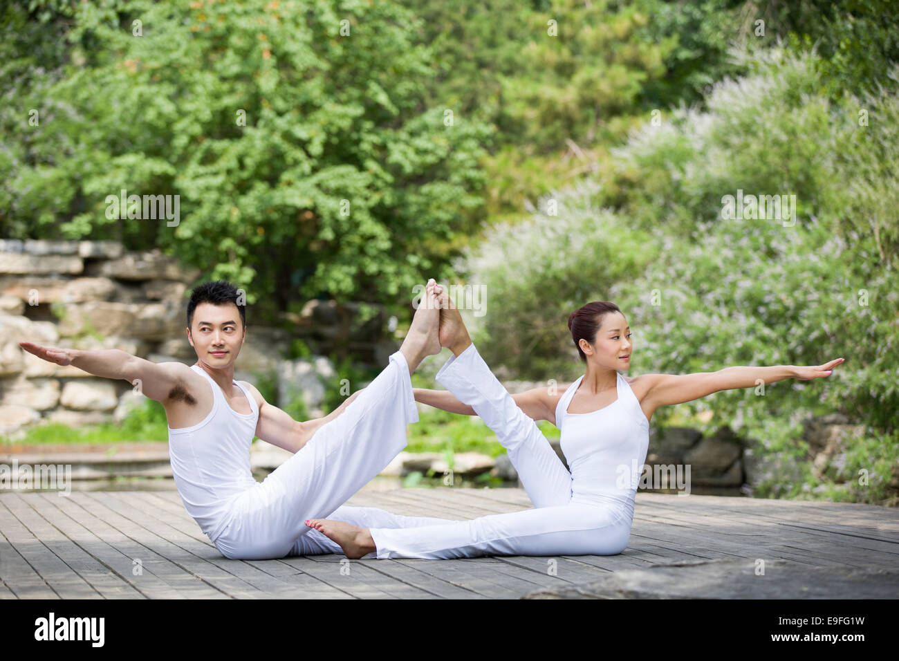 Floor couple young yoga hi-res stock photography and images - Alamy