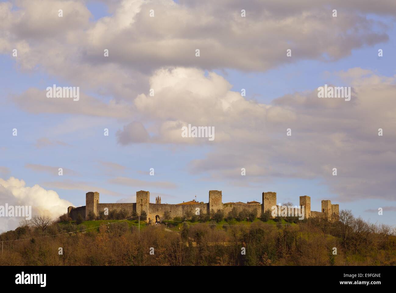 City wall of monteriggioni with field hi-res stock photography and ...