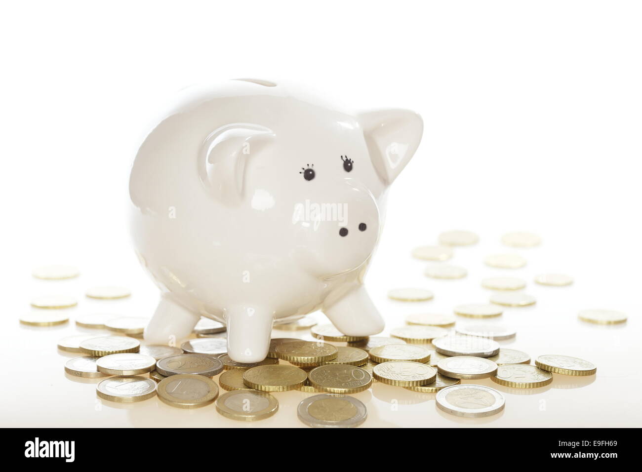 saving many coins Stock Photo - Alamy