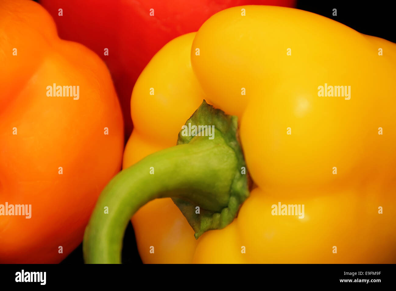 Red and yellow raw pepper Stock Photo - Alamy