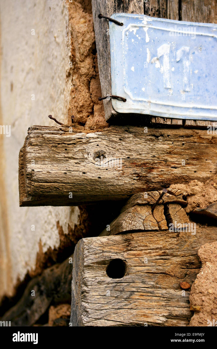 Old block number sign on old village house Stock Photo - Alamy