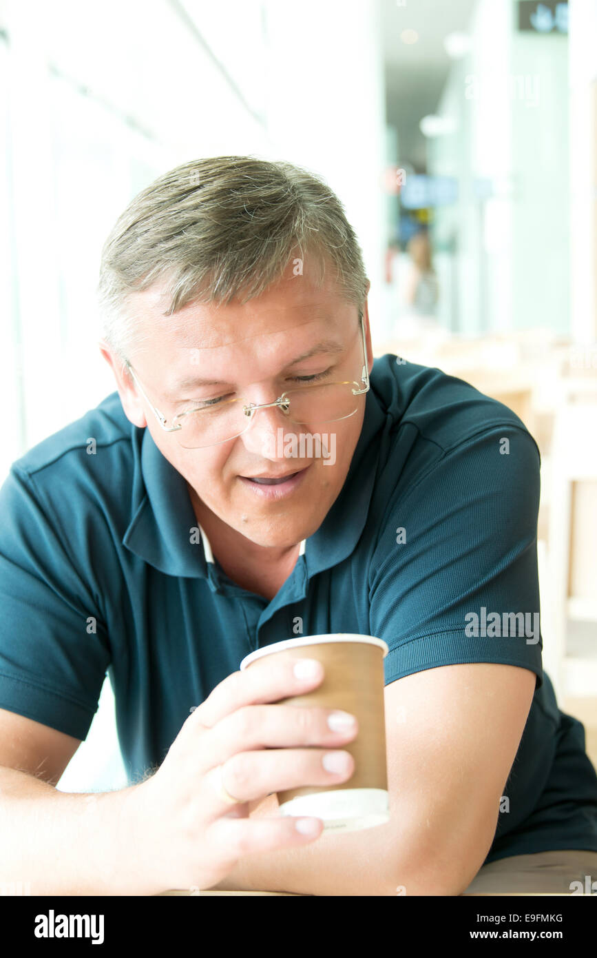 man looking into coffee cup Stock Photo - Alamy man looking into coffee cup Stock Photo - Alamy