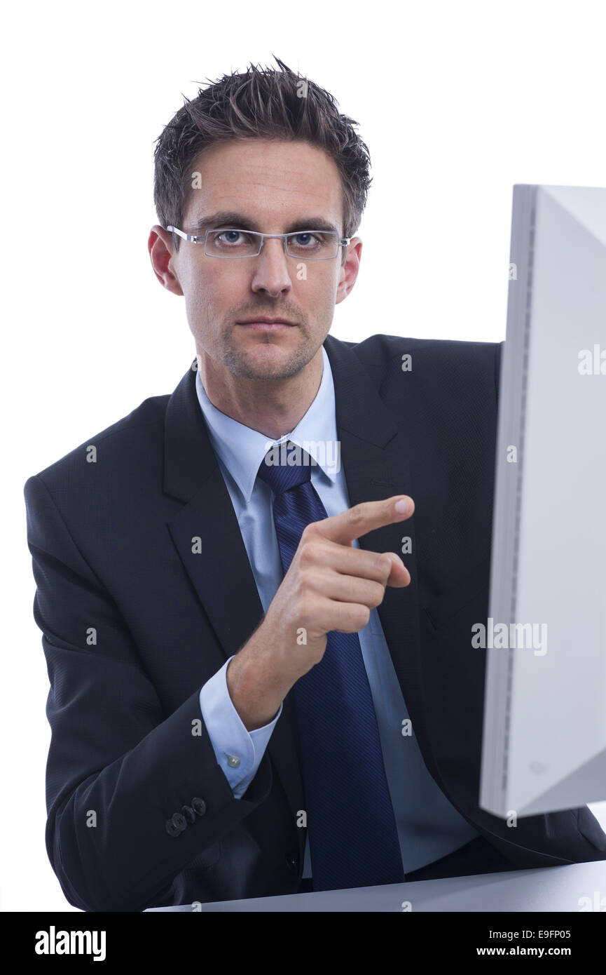 Thoughtful businessman in front of a screen Stock Photo - Alamy