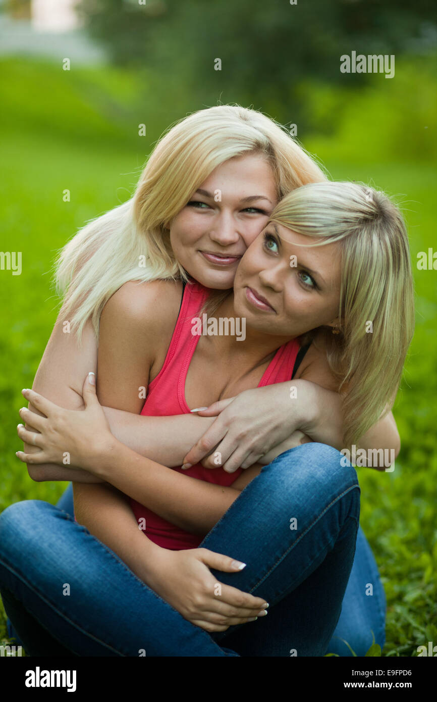 Sitting hug hi-res stock photography and images - Alamy