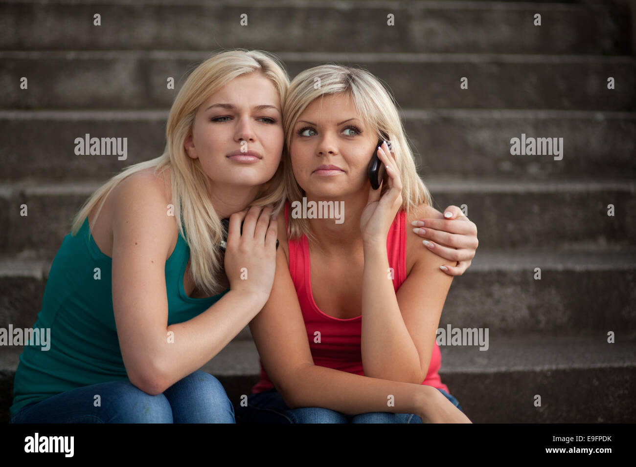 Women with cell phones hi-res stock photography and images - Alamy
