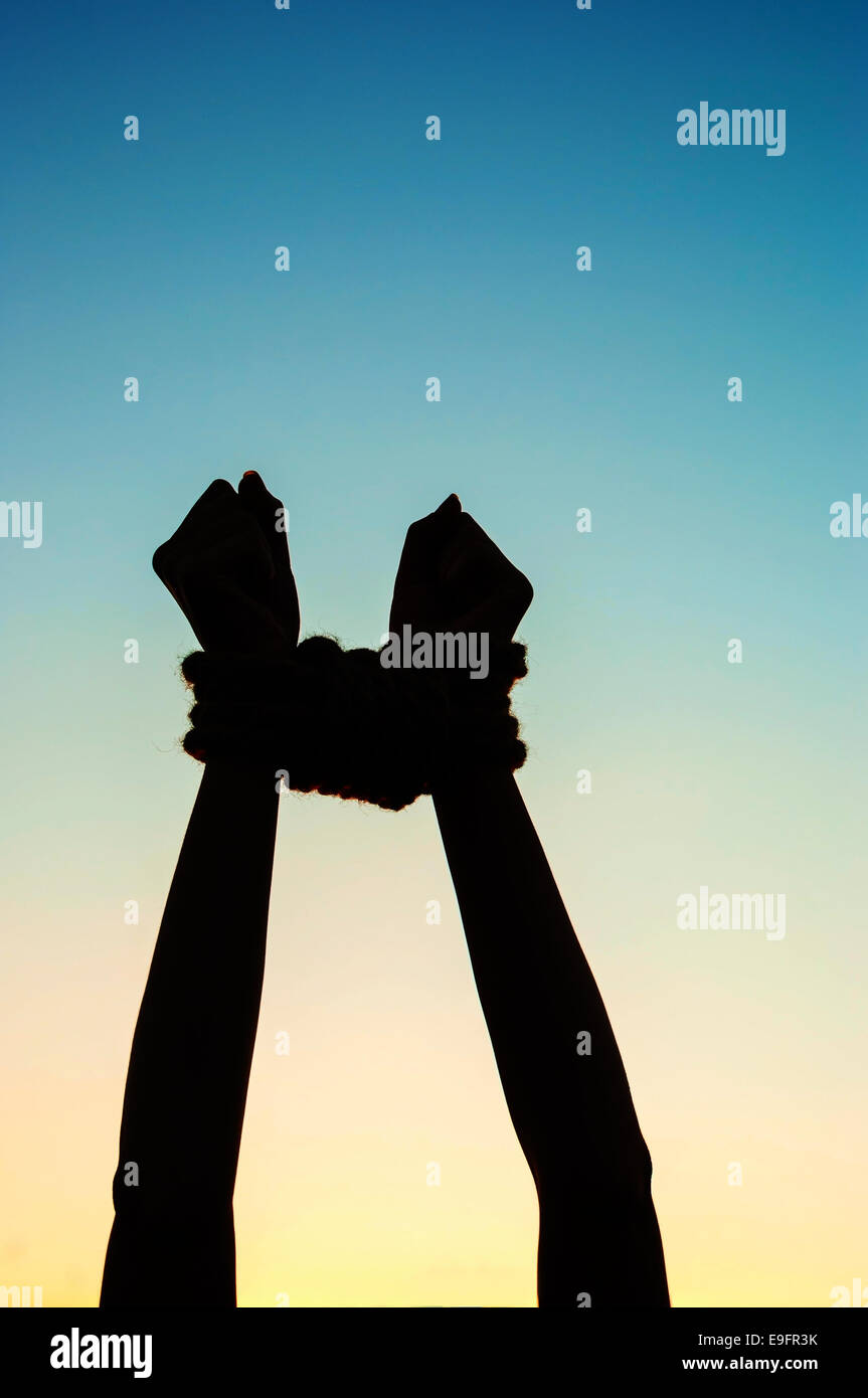 Hand tied rope woman hi-res stock photography and images - Alamy