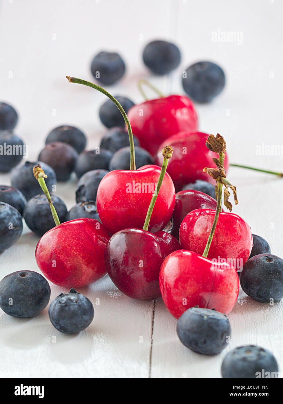 Cherries and blueberries Stock Photo - Alamy