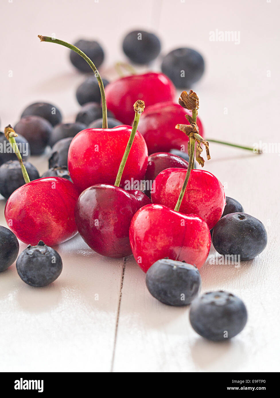 Cherries and blueberries Stock Photo - Alamy