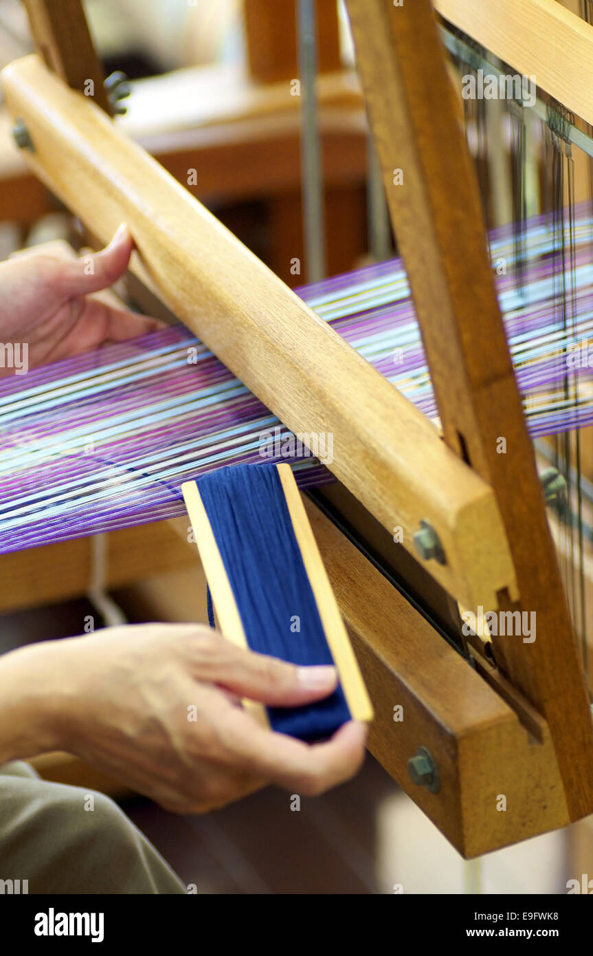 Working on loom hi-res stock photography and images - Alamy