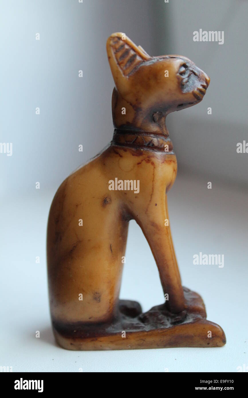 yellow stone cat for luck gift from sunny Egypt Stock Photo - Alamy