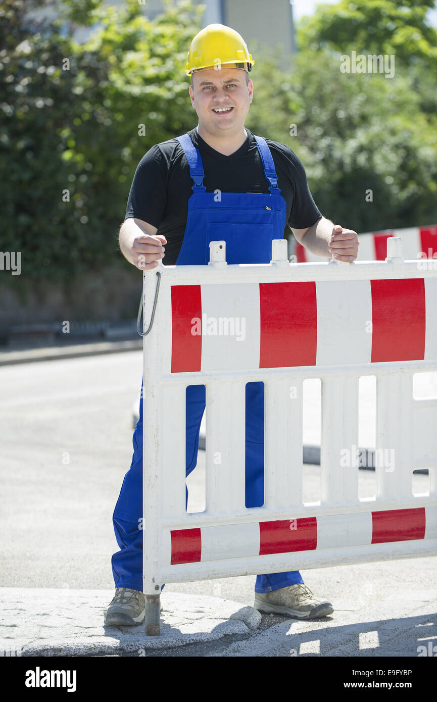 Workers checked the Construction Barrier Stock Photo - Alamy