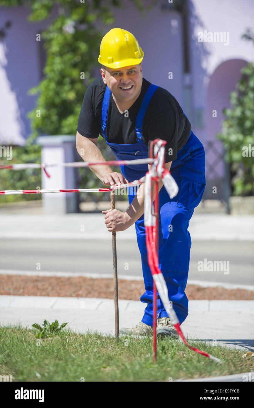 Workers checked the Construction Barrier Stock Photo - Alamy