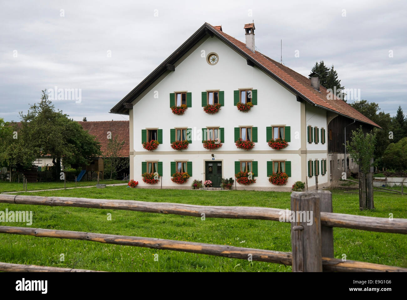 Beautiful residential building in the alpine village, foothills of the ...