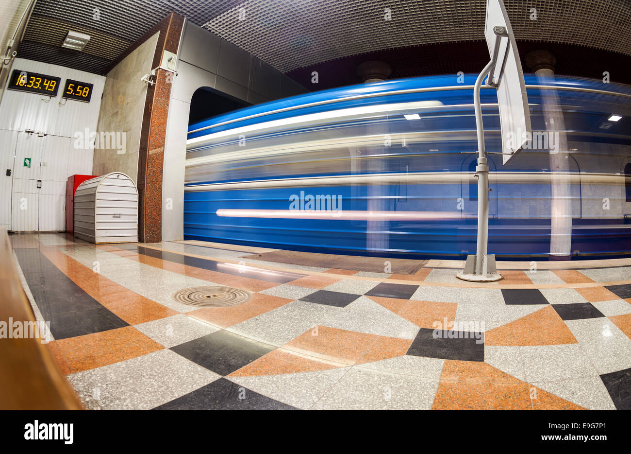 Wide angle view of modern light blue illuminated and spacious public ...