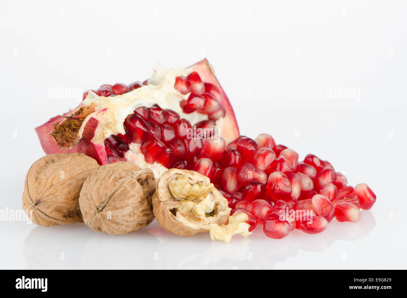 Half pomegranate fruit Stock Photo - Alamy