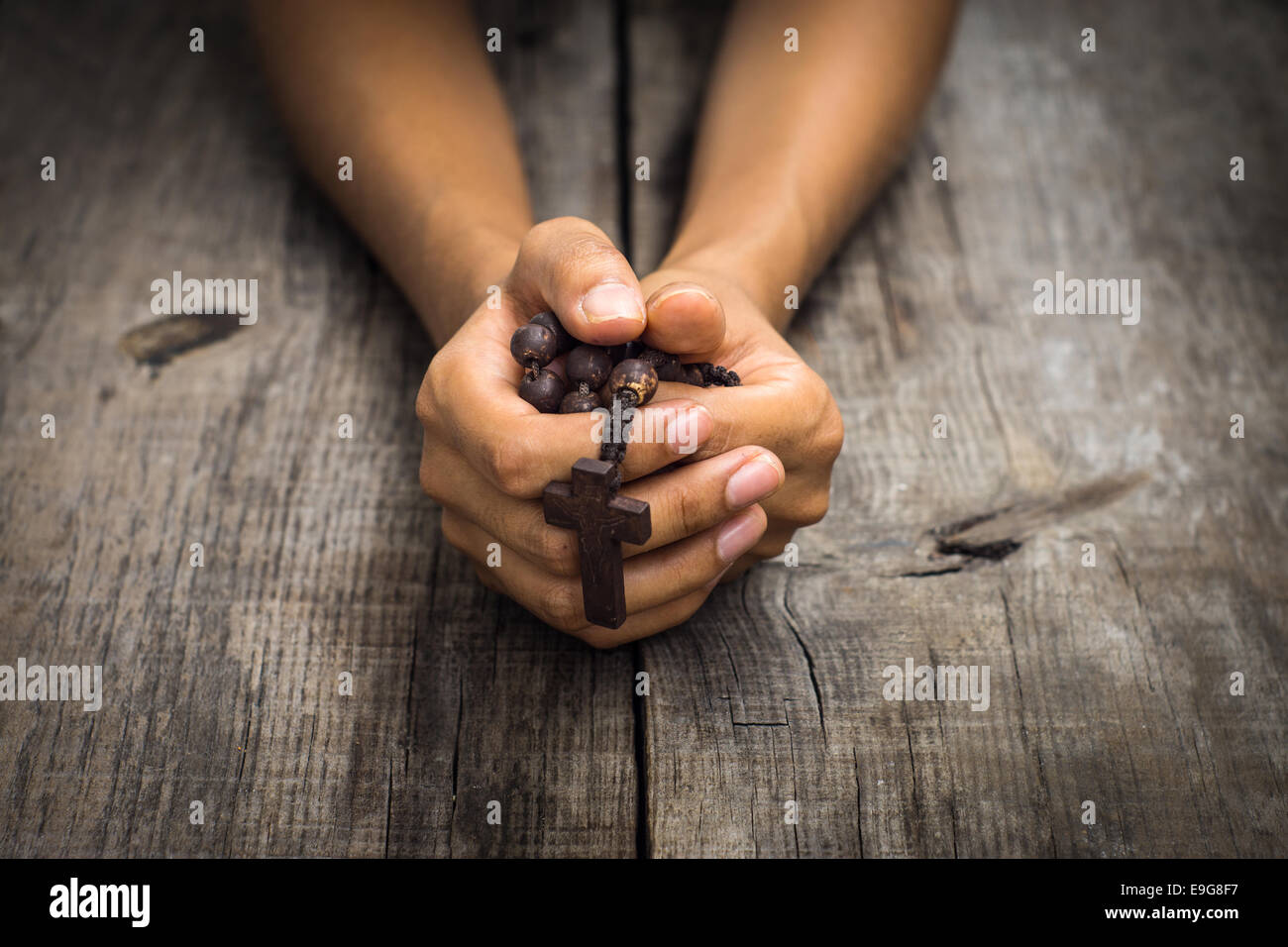 Person praying hi-res stock photography and images - Alamy
