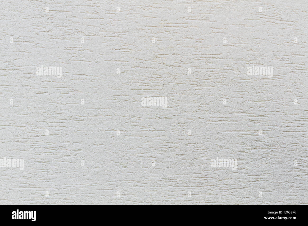 Wall painted in white with structure Stock Photo - Alamy