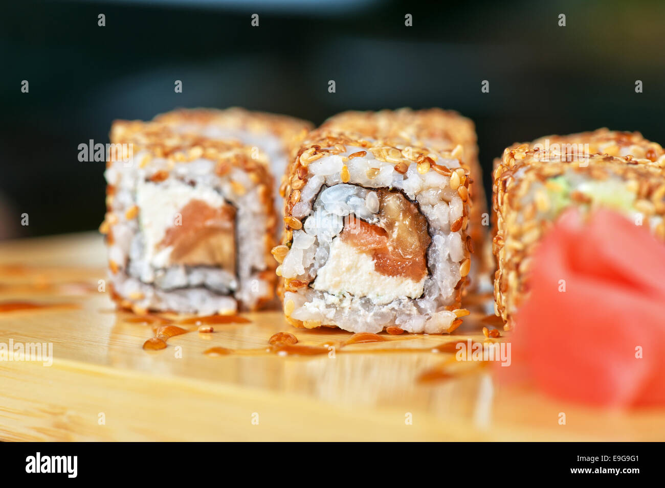 sesame sushi rolls Stock Photo - Alamy