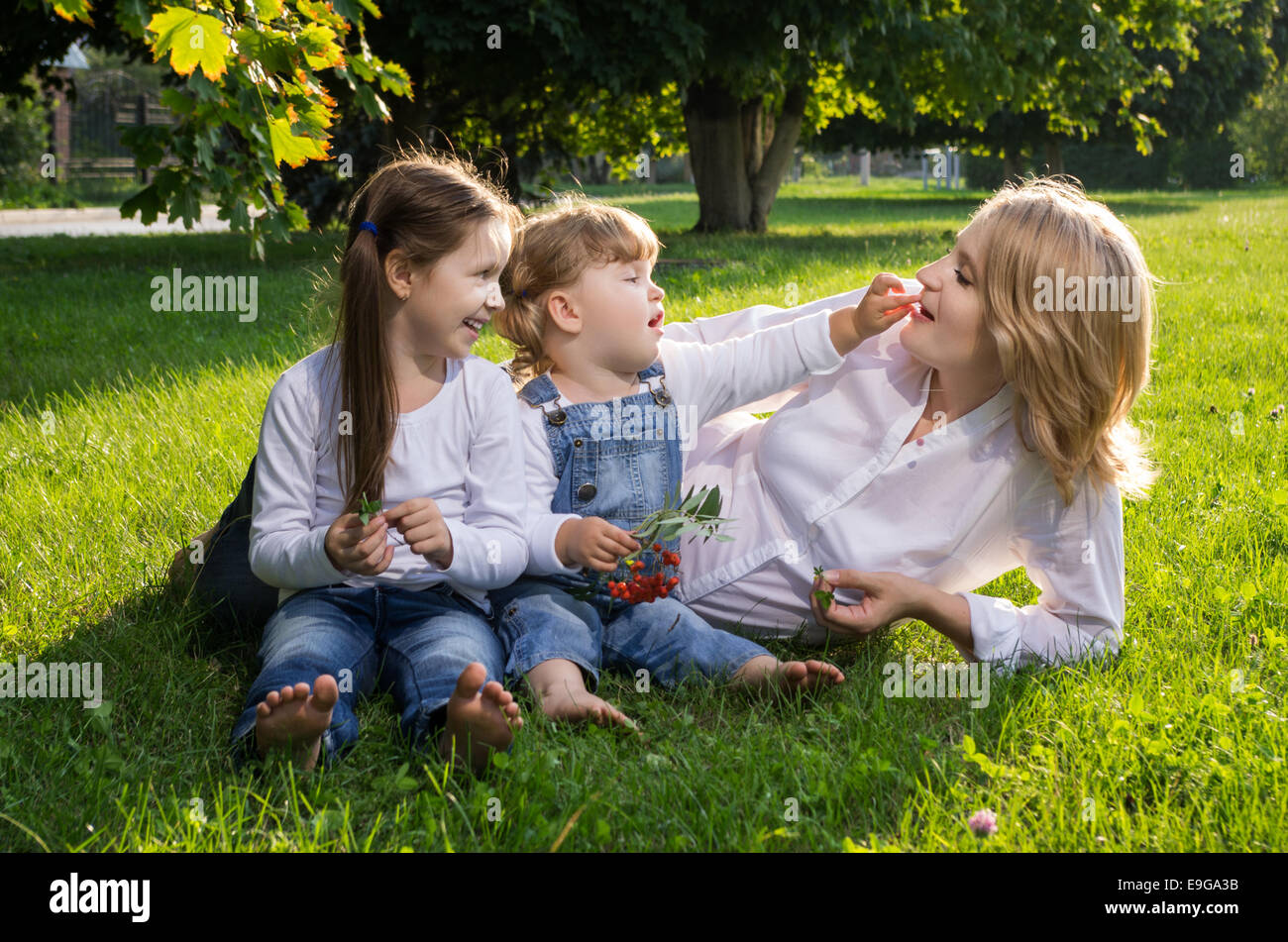Mother and two daughters Stock Photo - Alamy