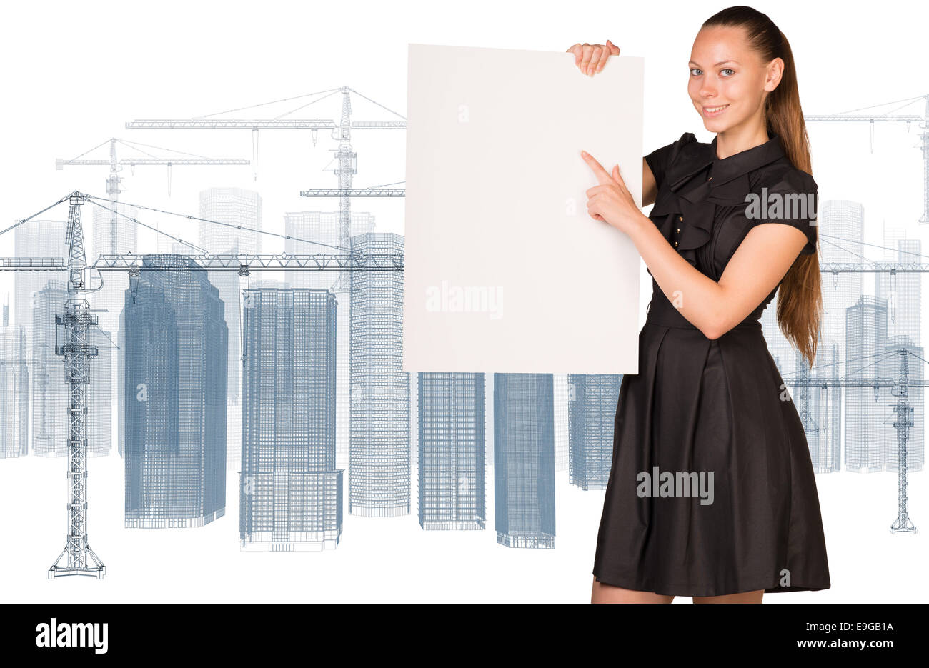 Businesswoman holding empty paper. Construction site with tower cranes ...