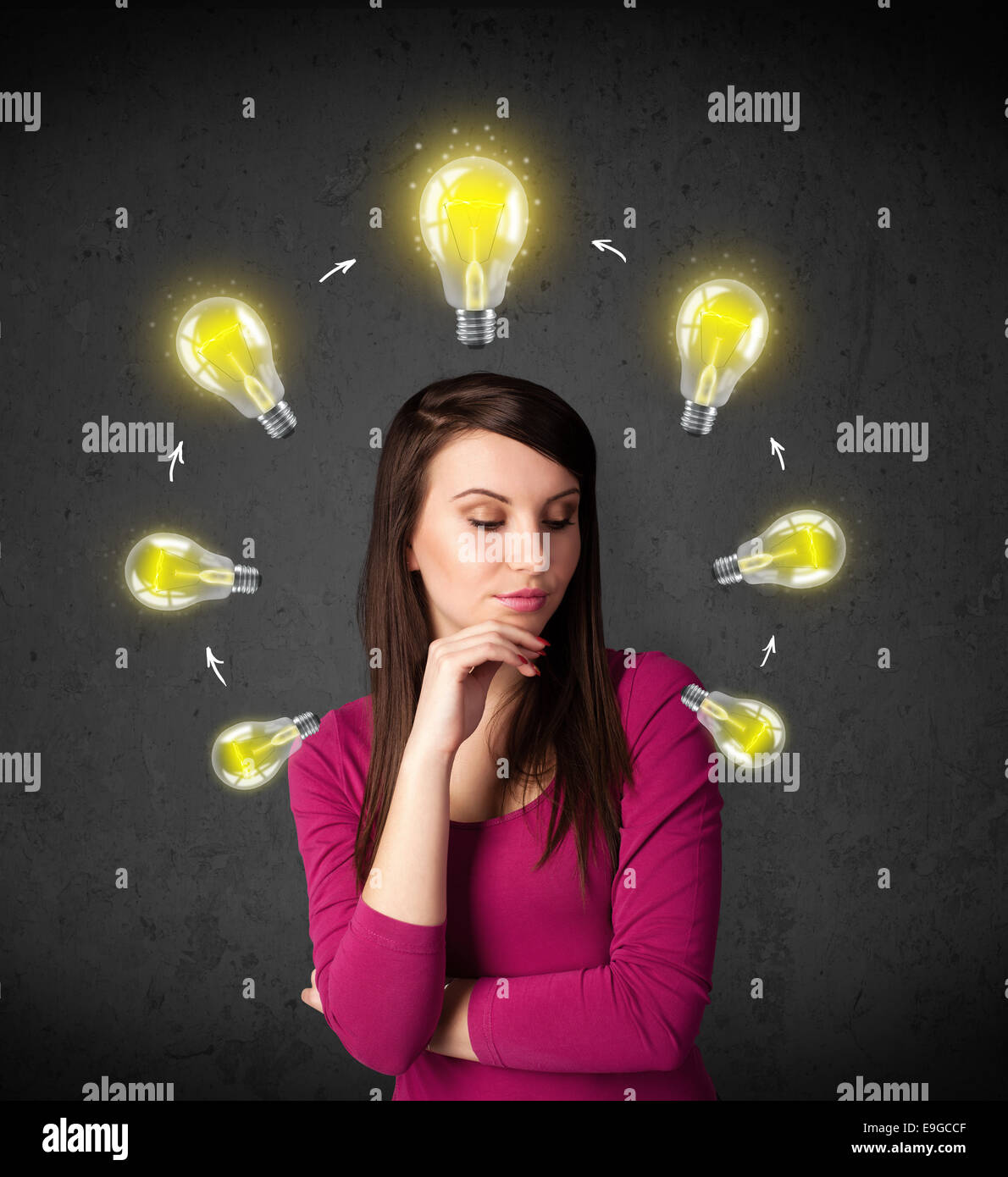 Young woman thinking with lightbulb circulation around her head Stock ...