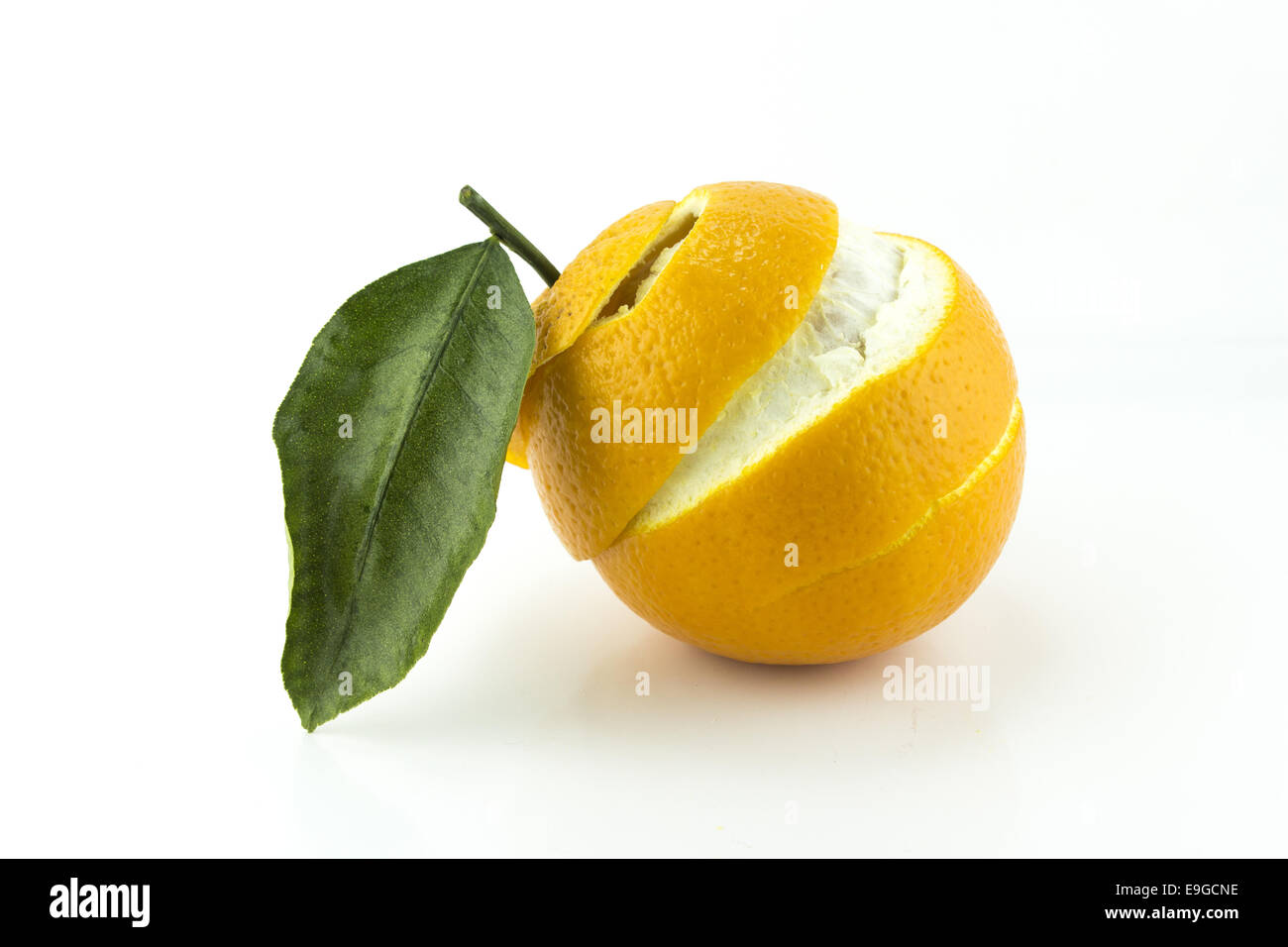 Sweet orange with peeled Stock Photo - Alamy