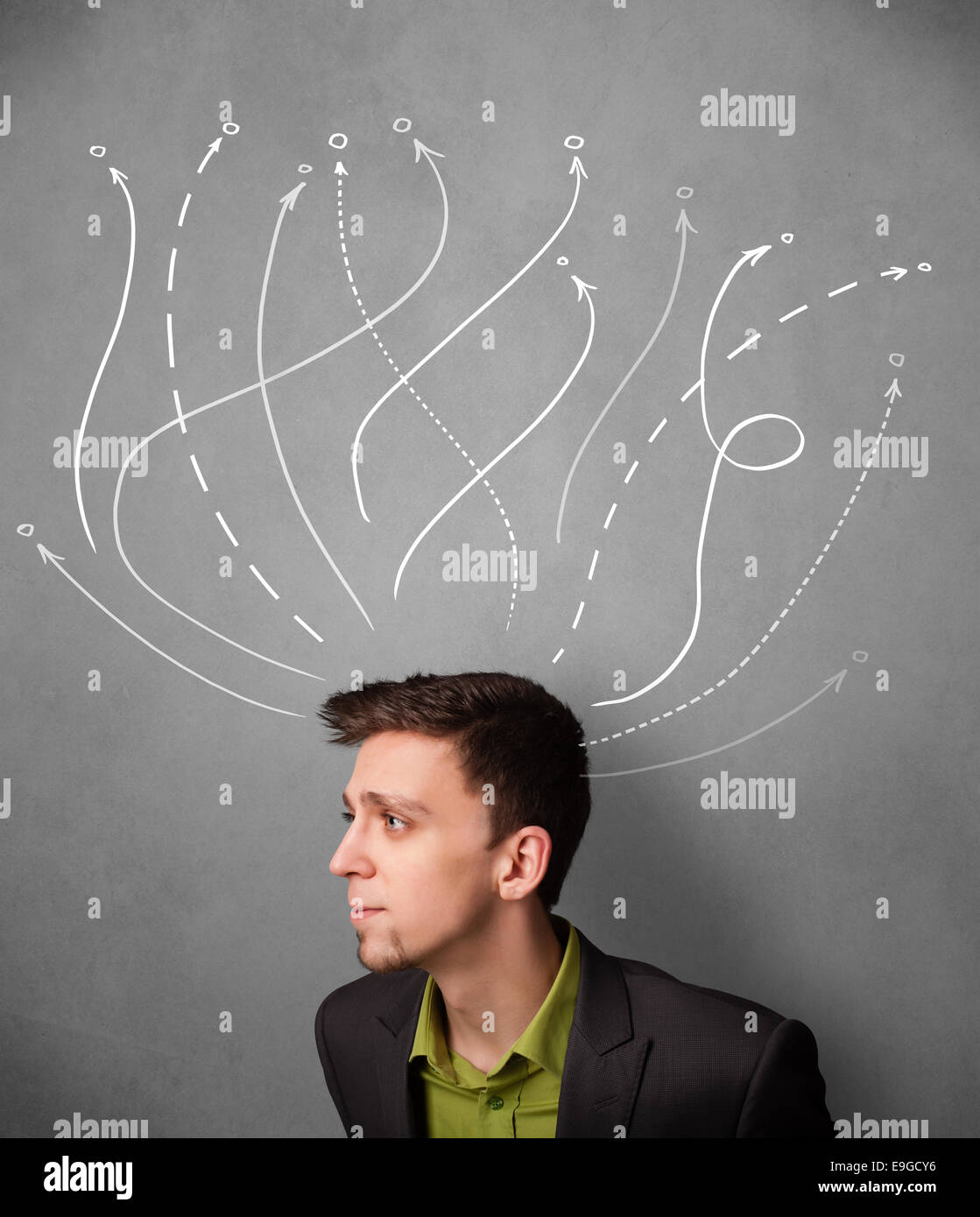 Businessman with arrows coming out of his head Stock Photo - Alamy