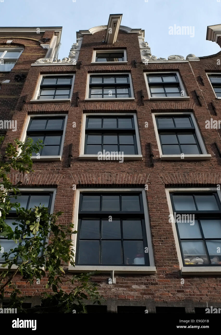amsterdam town house roof top and windows with blue sky, amsterdam ...