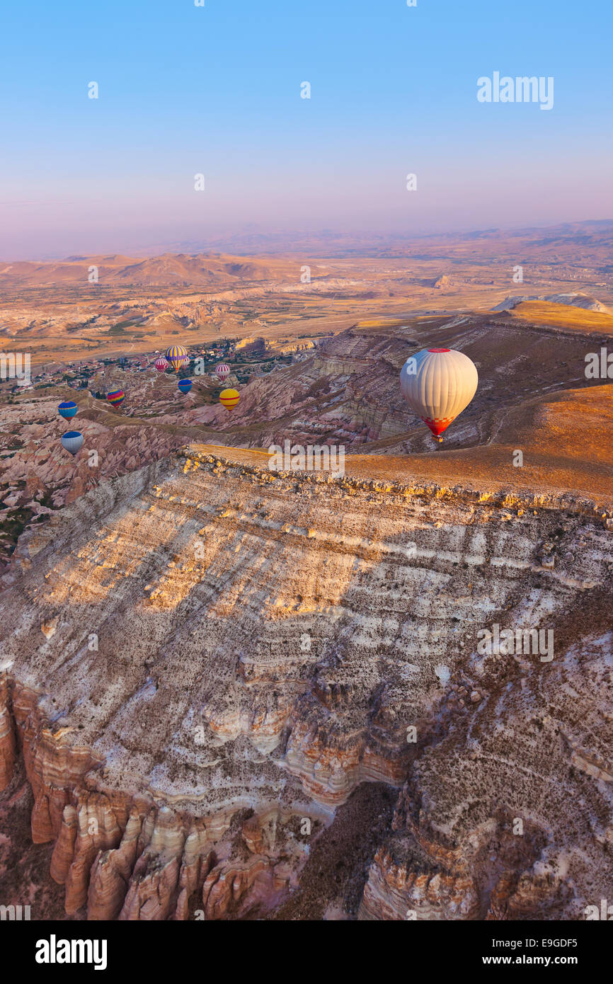 Hot air balloon flying over Cappadocia Turkey Stock Photo - Alamy