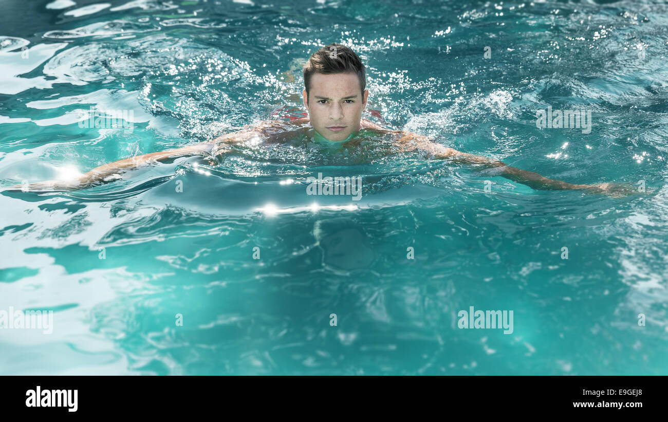 young man swimming Stock Photo - Alamy