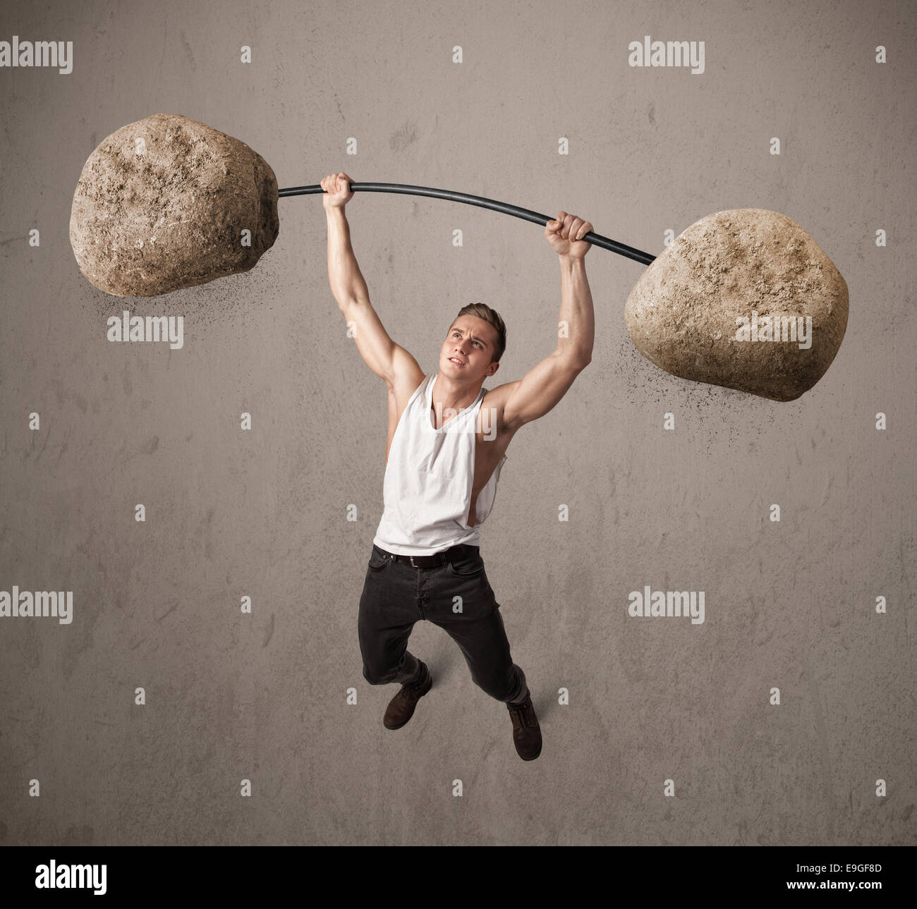 muscular man lifting large rock stone weights Stock Photo - Alamy