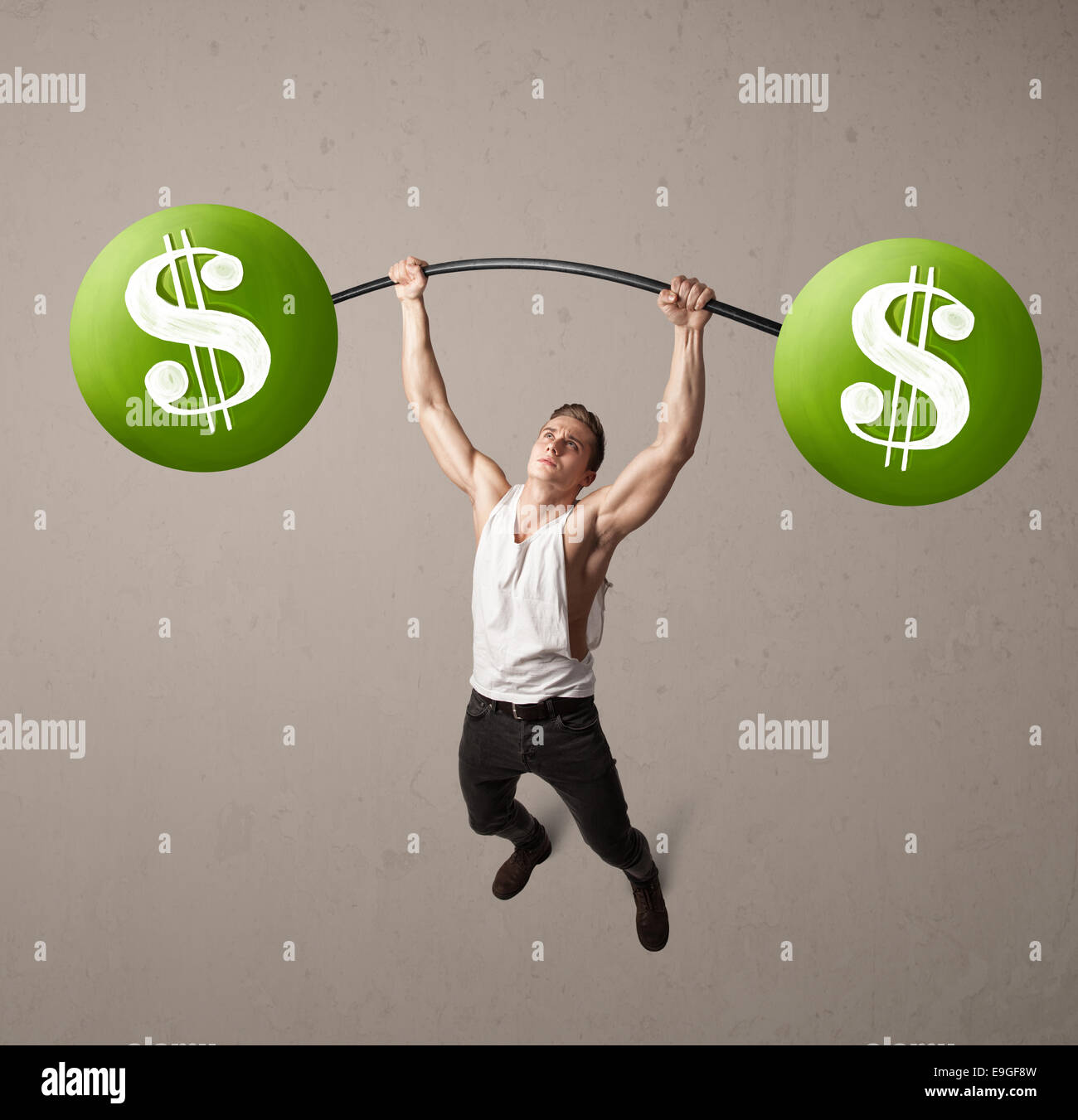 muscular man lifting green dollar sign weights Stock Photo - Alamy