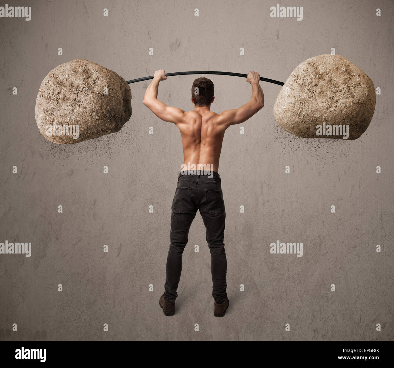 muscular man lifting large rock stone weights Stock Photo - Alamy