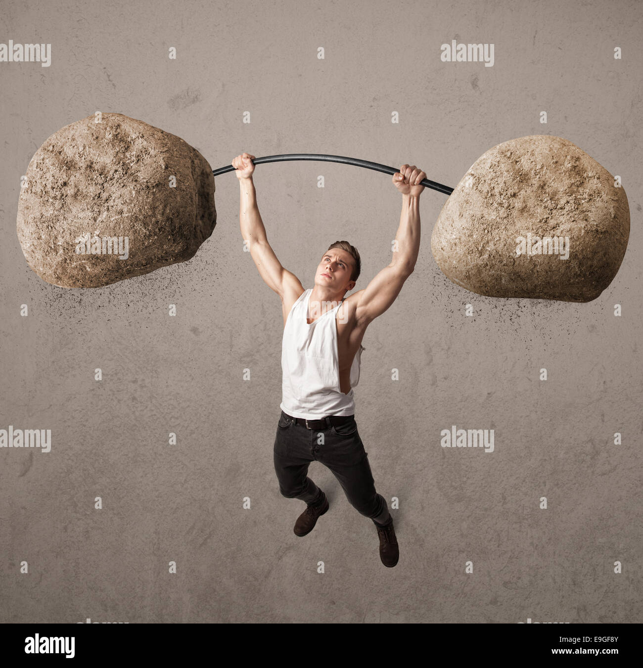 muscular man lifting large rock stone weights Stock Photo - Alamy