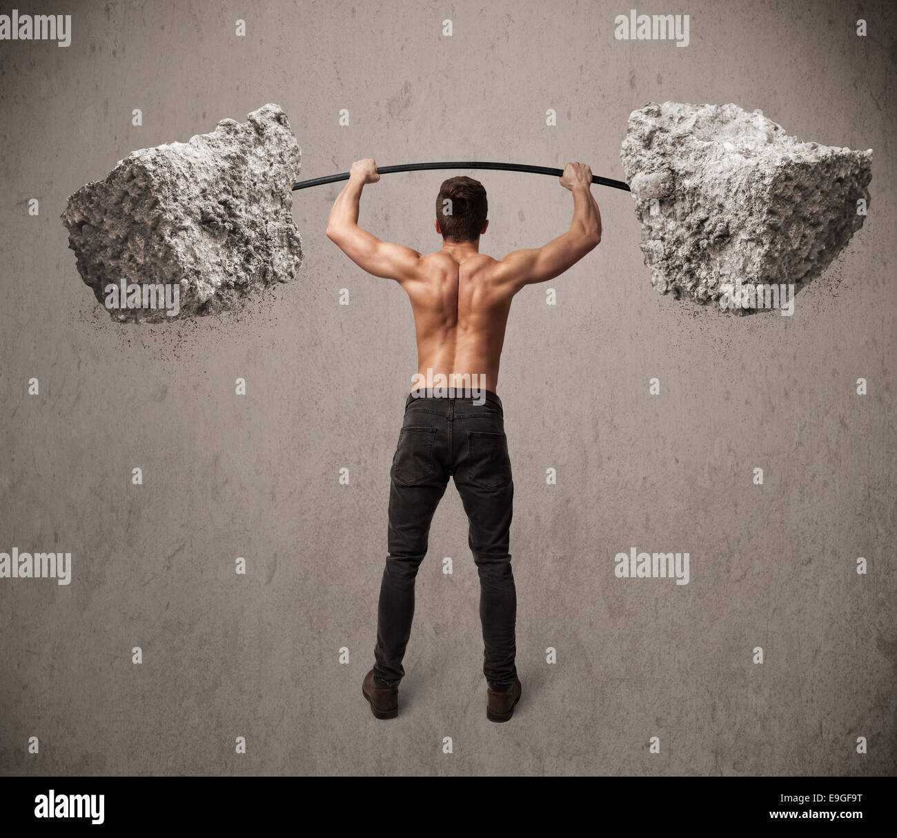 muscular man lifting large rock stone weights Stock Photo - Alamy