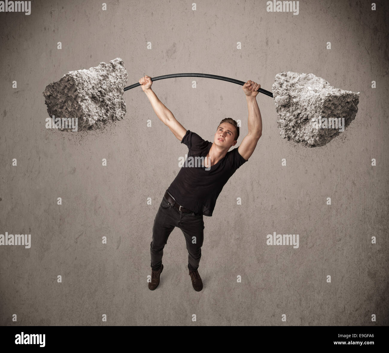 muscular man lifting large rock stone weights Stock Photo - Alamy