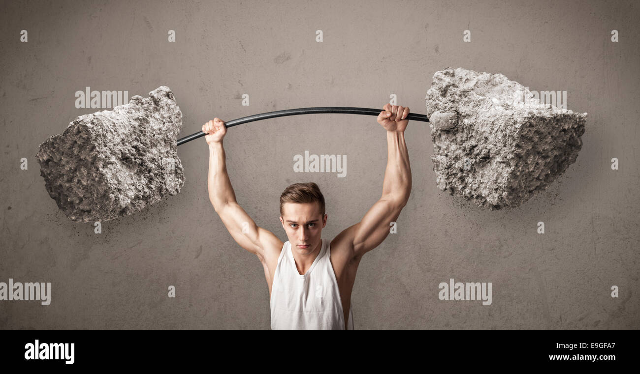 muscular man lifting large rock stone weights Stock Photo - Alamy