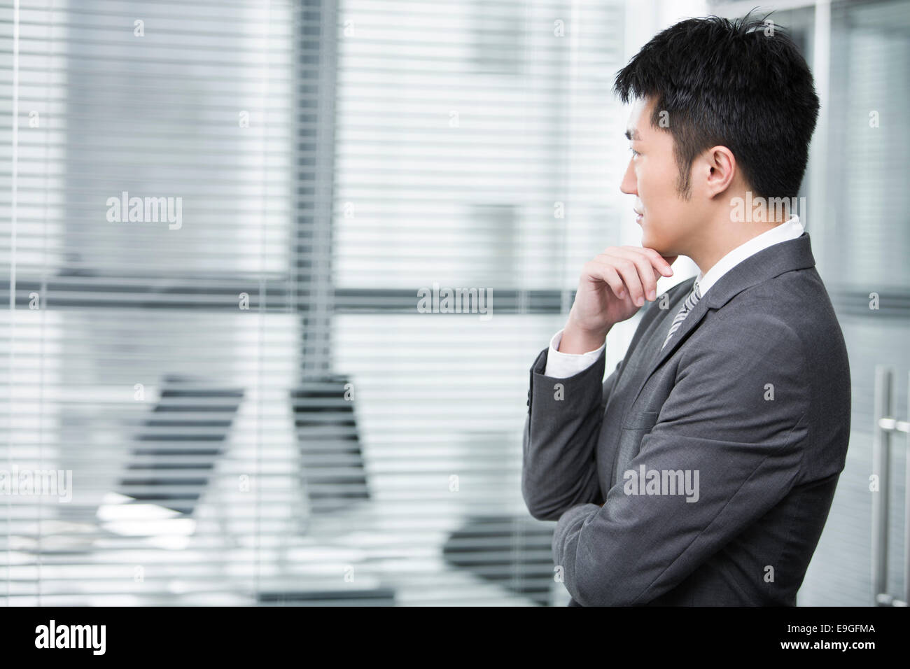 Side profile businessman glass hi-res stock photography and images - Alamy
