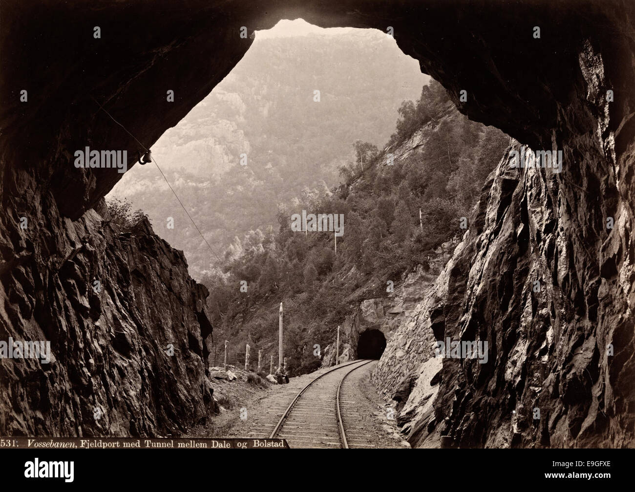 This photograph, taken by Axel Lindahl, shows the Vossebanen railway ...