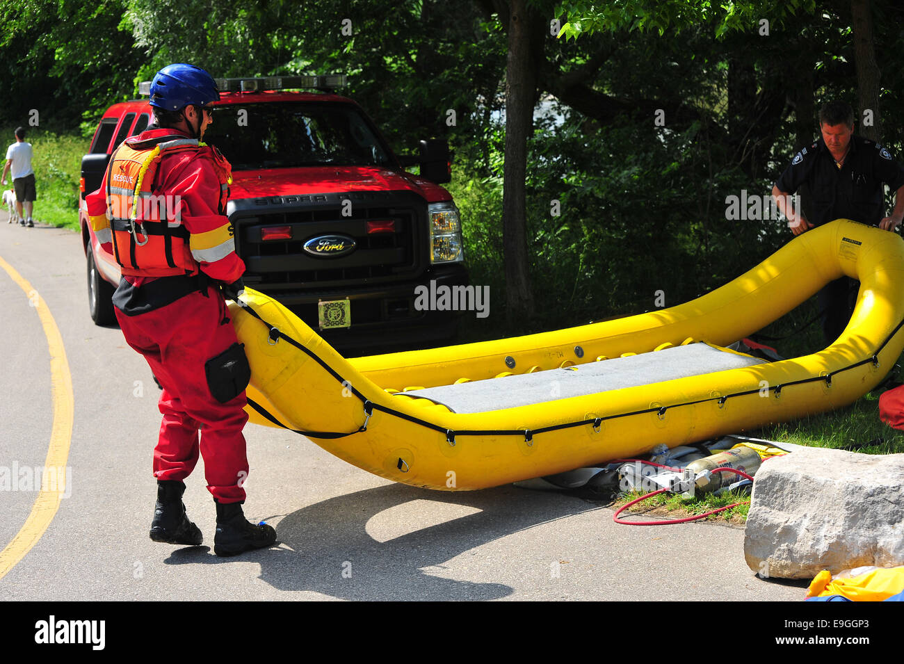 Search and rescue teams operate by the river Thames in London, Ontario ...
