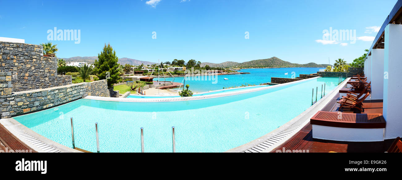 Panorama of swimming pool at luxury hotel, Crete, Greece Stock Photo ...