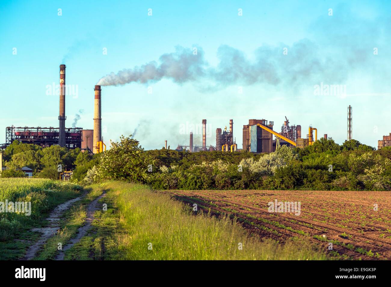 Rural landscape with factory Stock Photo - Alamy