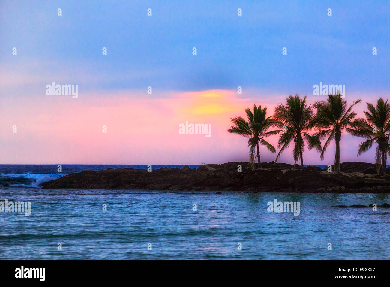 Sunset with palms in Milolii , Hawaii Stock Photo - Alamy